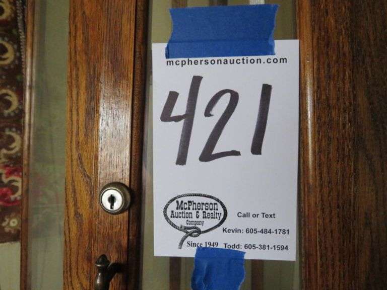 SPINNING GUN CASE WITH LOWER DRAWER - McPherson Auction & Realty