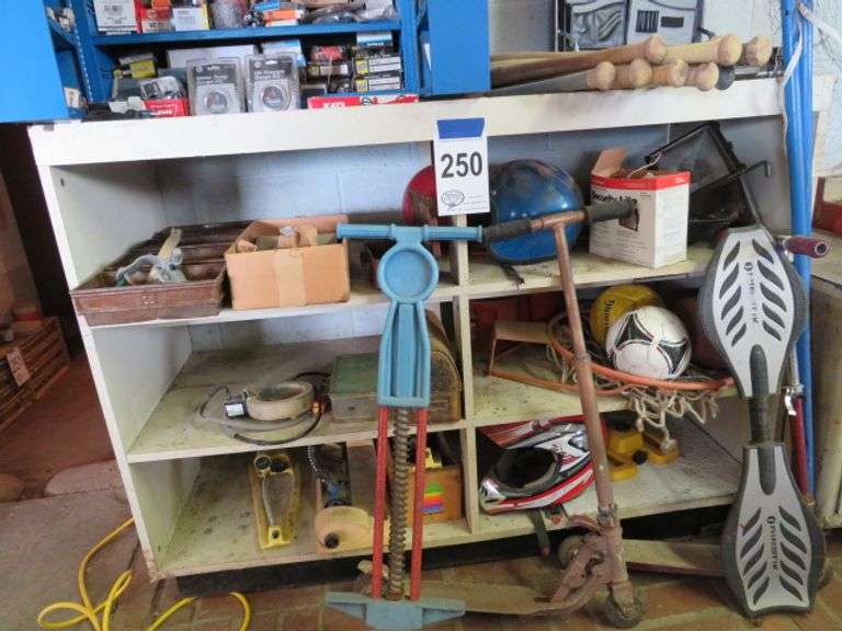 WOODEN BASEBALL BATS POGO STICK RIPSTICK AND SEVERAL SPORTING ITEMS ETC ...