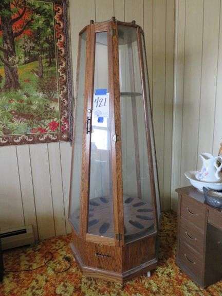 SPINNING GUN CASE WITH LOWER DRAWER - McPherson Auction & Realty