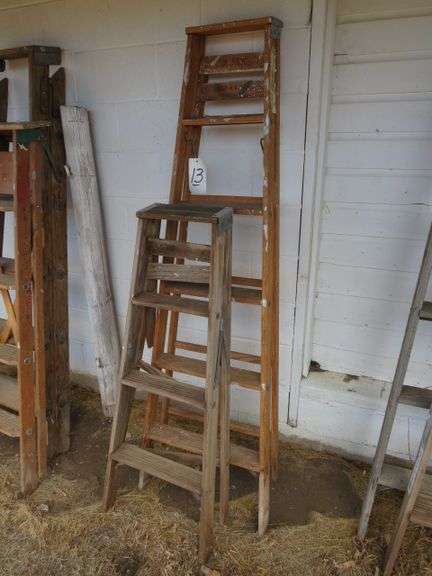 4' AND 6' WOODEN STEP LADDER - McPherson Auction & Realty