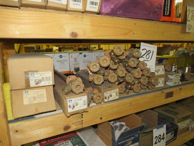 LARGE GROUP OF NEW FREEZELESS WALL FAUCETS - McPherson Auction & Realty