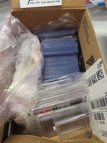 BOX OF TAGS AND CARD SLEEVES - McPherson Auction & Realty