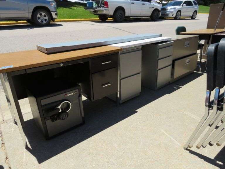 FOUR DRAWER FILE CABINET, FIVE DESKS AND TABLES AND SMALL SENTRY SAFE ...