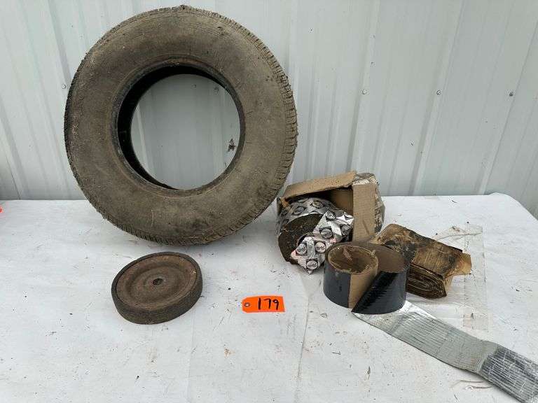 Spare Tire, Wheel, Window Tape - Meagher Auctioneers