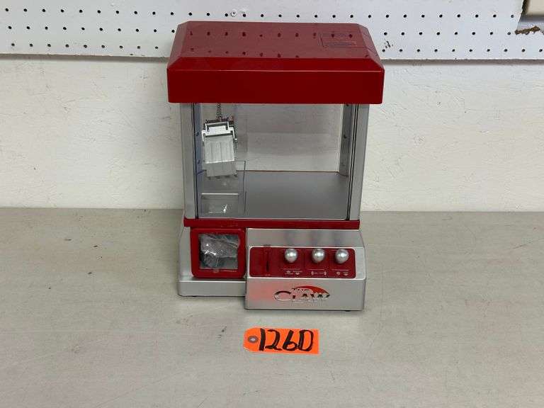 The Claw Coin Machine - Meagher Auctioneers