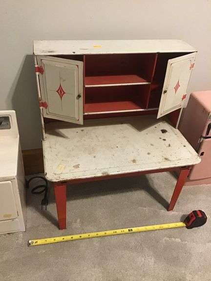 Child’s metal Baking table - Metzger Property Services, LLC
