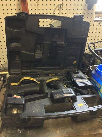 Contents on top of Workbench and peg board , Craftsman cordless drill ...