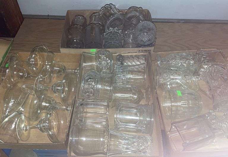 Stemmed glasses, glass tealight holders, decorative glass cups, other ...