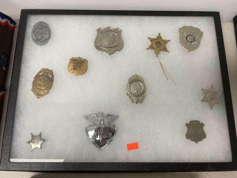 Vintage police badges - Metzger Property Services, LLC
