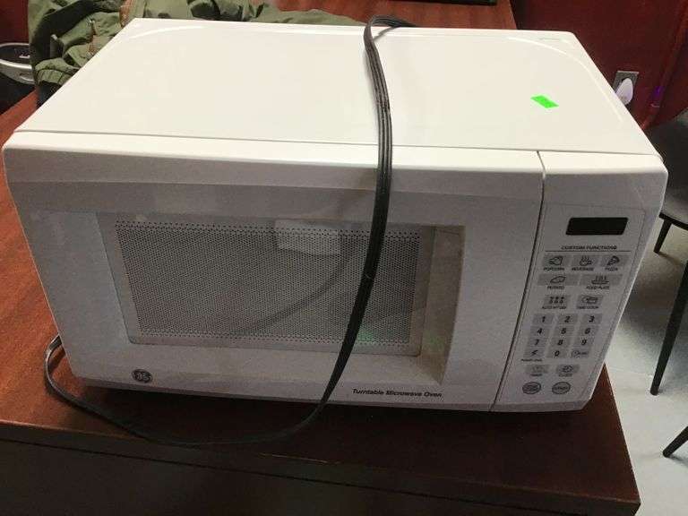 GE turntable microwave- located at: 111 S. Fifth St., Logansport, IN ...