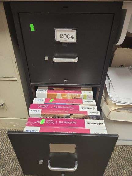 Filing cabinet with vinyl tile sample books - Metzger Property Services ...