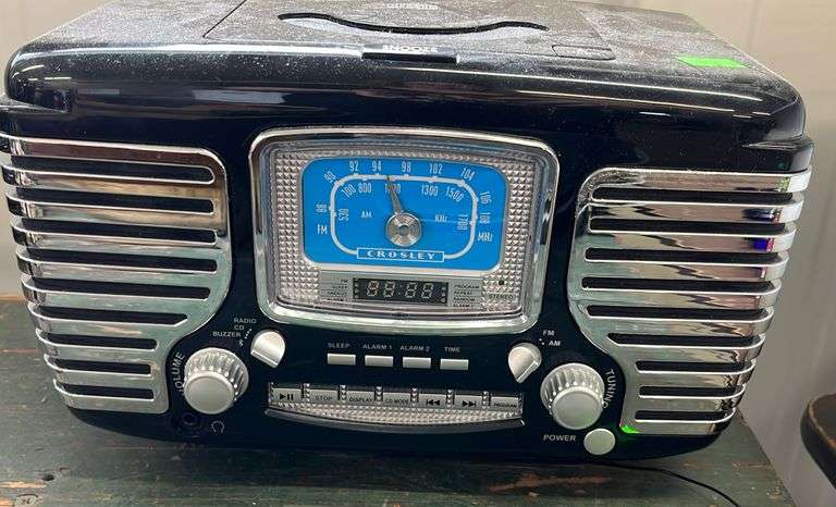 Radio/CD player/alarm clock - Metzger Property Services, LLC