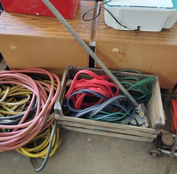 Metal pipe, electrical cords, crate, jumper cables - Metzger Property ...