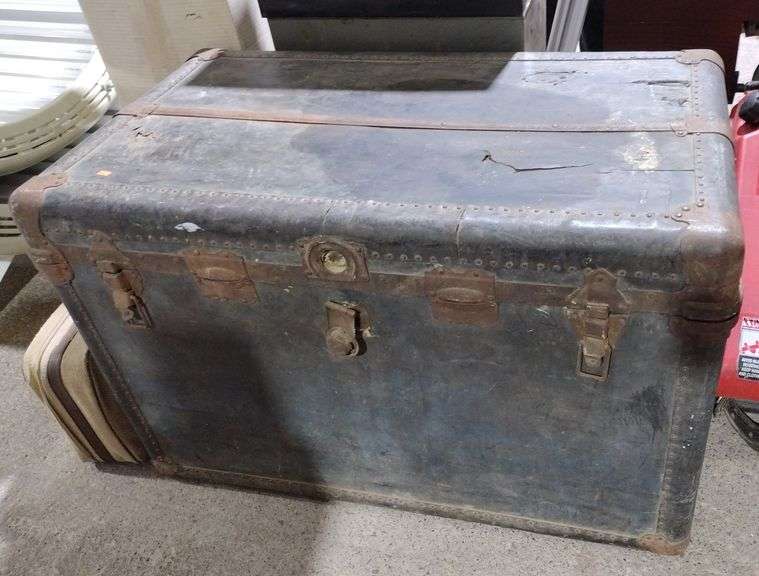Trunk with contents 22"x25"x38" - Metzger Property Services, LLC