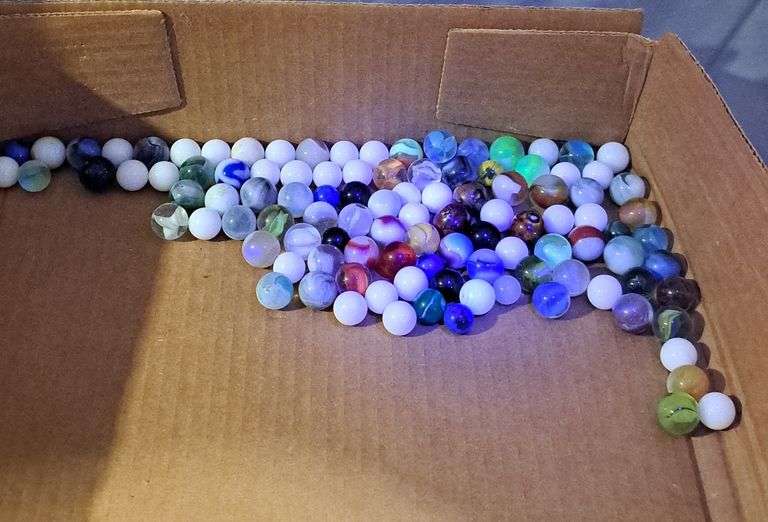 Marble assortment in jar 5.25" tall - Metzger Property Services, LLC