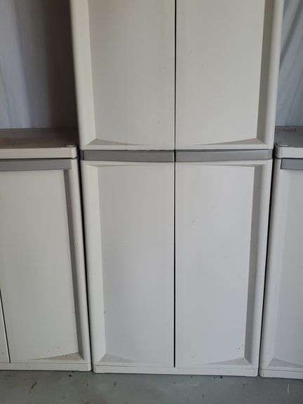 4 plastic storage cabinets with contents inc. faucet, grass seed ...