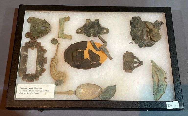 Excavated relics from southern civil war sites in display case ...