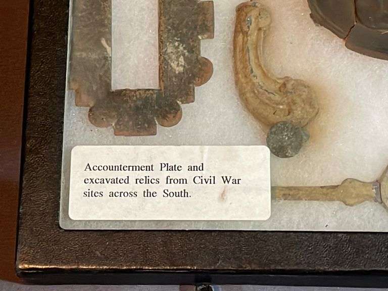 Excavated relics from southern civil war sites in display case ...