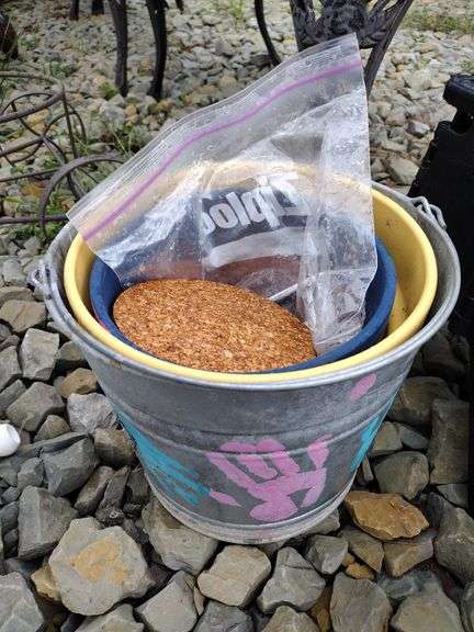 Bucket, planters - Metzger Property Services, LLC