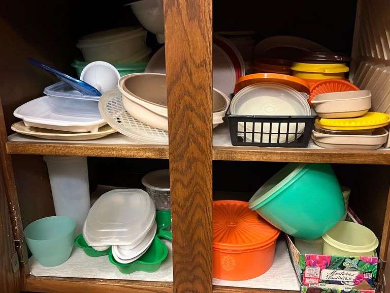 Plasticware including Tupperware, contents of cabinet as shown in ...