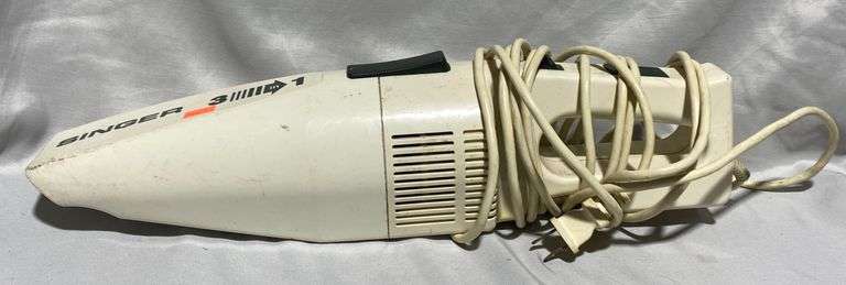 Singer 3 in 1 electric vacuum cleaner - Metzger Property Services, LLC