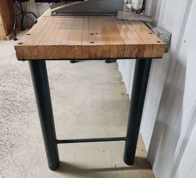 Work table 9' 8" L 23"D 33"T contents not included - Metzger Property ...