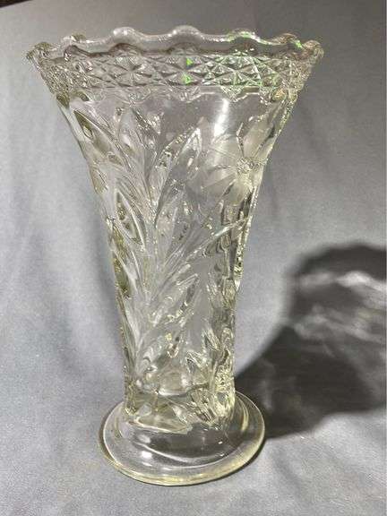 Clear glass vase 9 3/8”H (surface imperfections and rough bottom rim ...