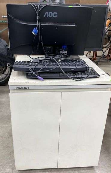 Panasonic Metal cabinet 24x24x29 with Dell keyboards, 2 led monitors 24 ...