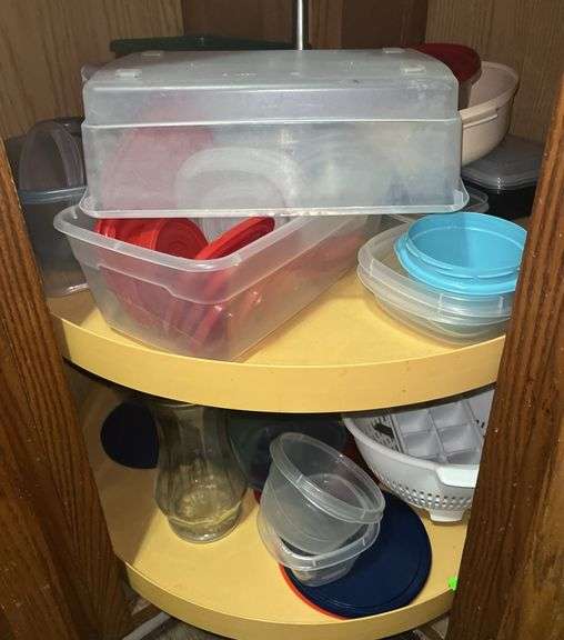 Plastic containers, misc. contents of cabinet as shown in pictures ...