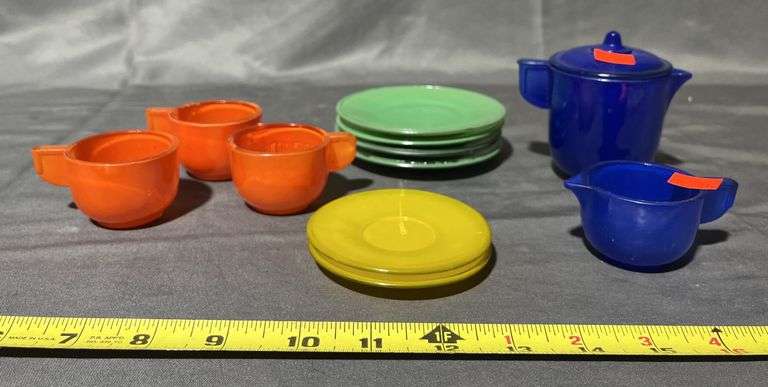 Miniature colored glass cups, saucers and cream - Metzger Property ...