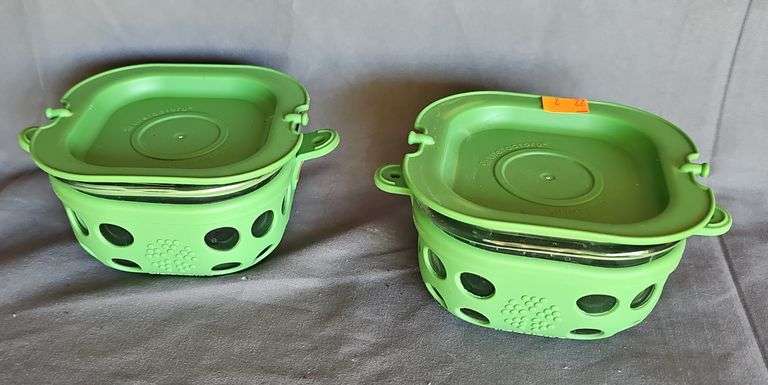 2 Glass rubber coated jam containers - Metzger Property Services, LLC