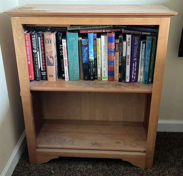 Bookcase 27 1/2x13x32 with book assortment - Metzger Property Services, LLC