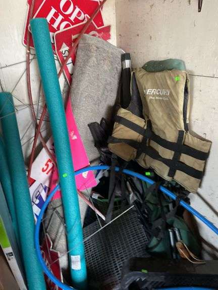 Box fan, pool noodles, Mercury life vest, contents of corner as shown ...