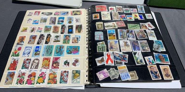 Folders w/ stamp collections - Metzger Property Services, LLC