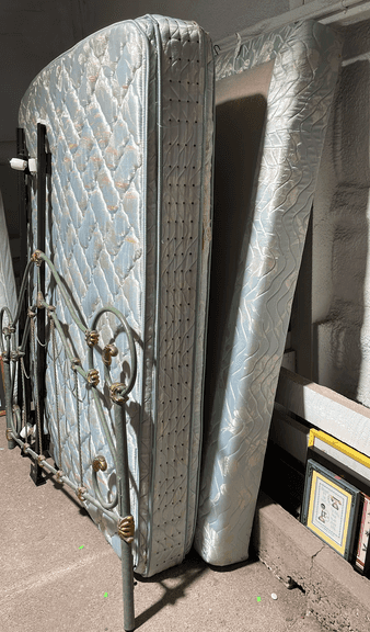 Queen size mattress (some visible wear/fabric tears) with box spring ...