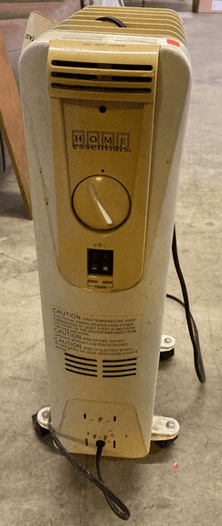 Home Essentials 1500W electric heater - Metzger Property Services, LLC