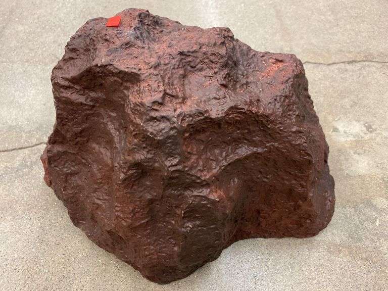 Red lava rock yard stone decoration - Metzger Property Services, LLC