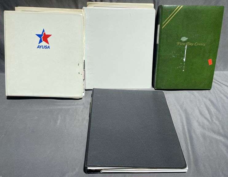 Folders w/ stamp collections - Metzger Property Services, LLC