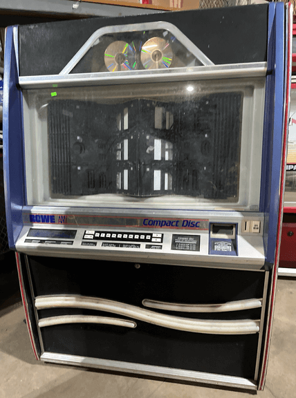 Rowe Ami compact disc jukebox (owner states powers up, no cord or key ...