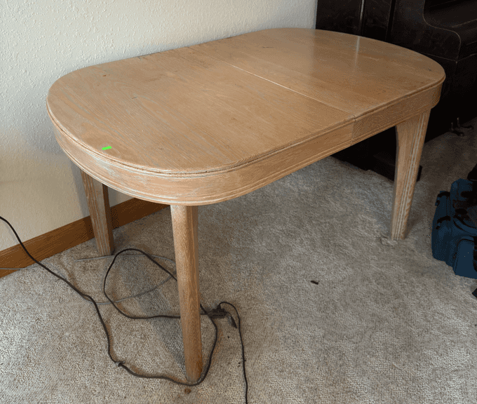 Seller Table with hide away leaf 51x34x29 - Metzger Property Services, LLC