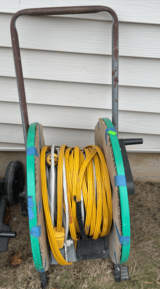 Extension cords and reel - Metzger Property Services, LLC