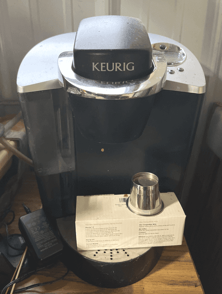 Keurig coffee maker - Metzger Property Services, LLC