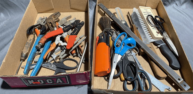 Hand tool assortment including pliers, scissors, screwdrivers, wire ...
