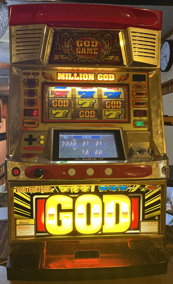 God Game slot machine 18 1/2x15 1/2x32 - Metzger Property Services, LLC