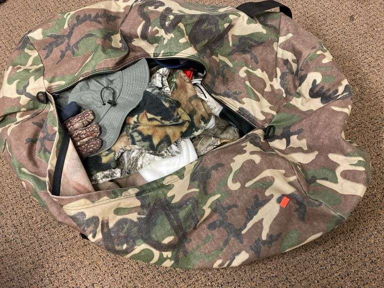 Large Tote with hunting clothes assortment - Metzger Property Services, LLC