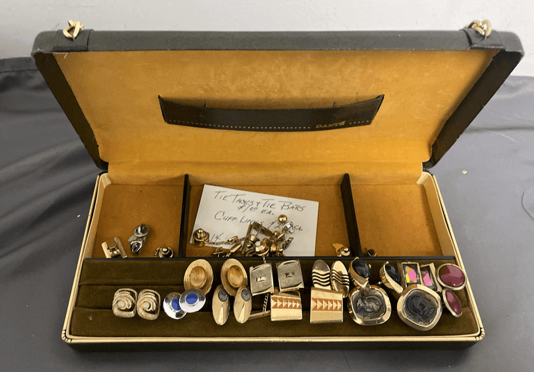 Cufflink assortment in jewelry case - Metzger Property Services, LLC