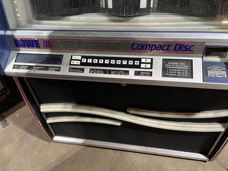 Rowe Ami compact disc jukebox (owner states powers up, no cord or key ...