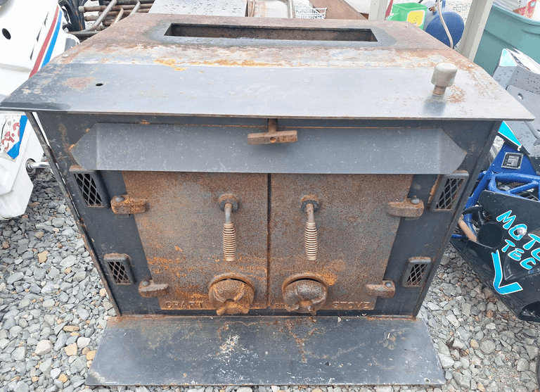 Wood stove - Metzger Property Services, LLC