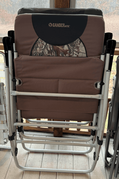 2 Gander Mountain folding rocking chairs - Metzger Property Services, LLC