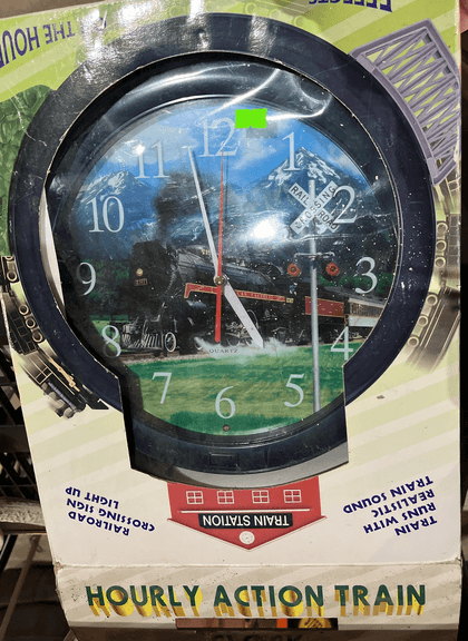 Hourly action train clock - Metzger Property Services, LLC